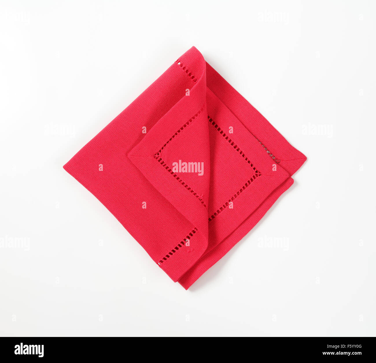 red place mat on white background Stock Photo - Alamy