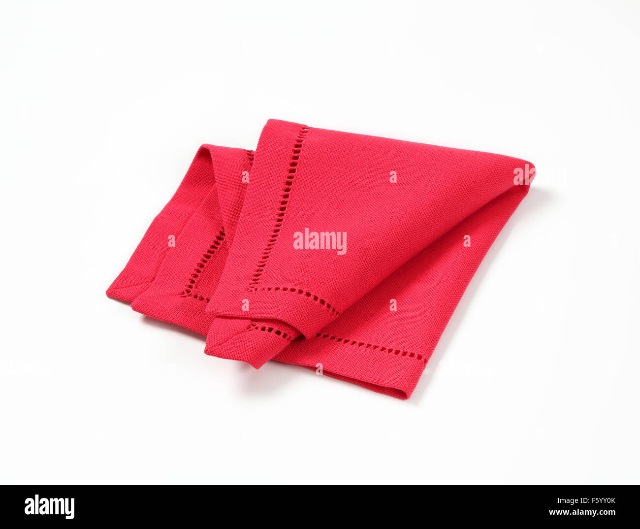 red place mat on white background Stock Photo - Alamy