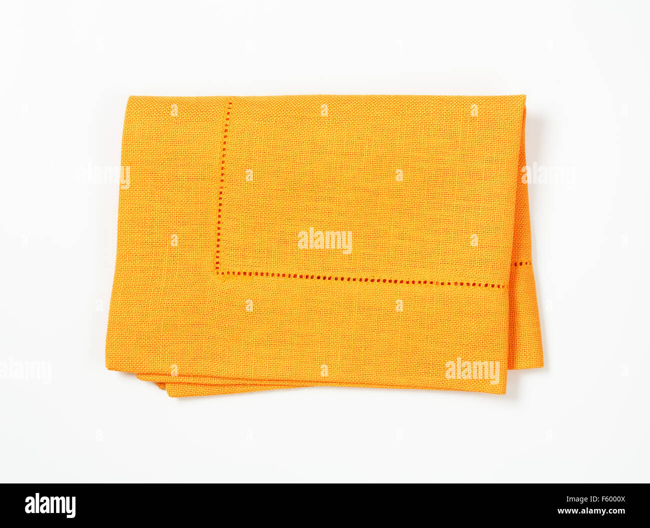 yellow place mat on white background Stock Photo - Alamy