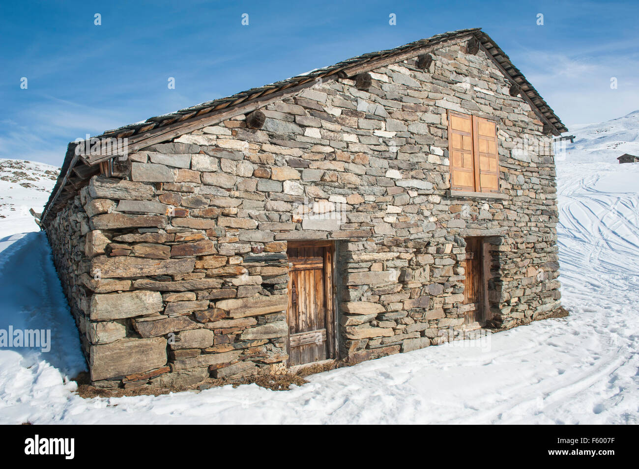 Alpine house covered with snow hi-res stock photography and images - Alamy