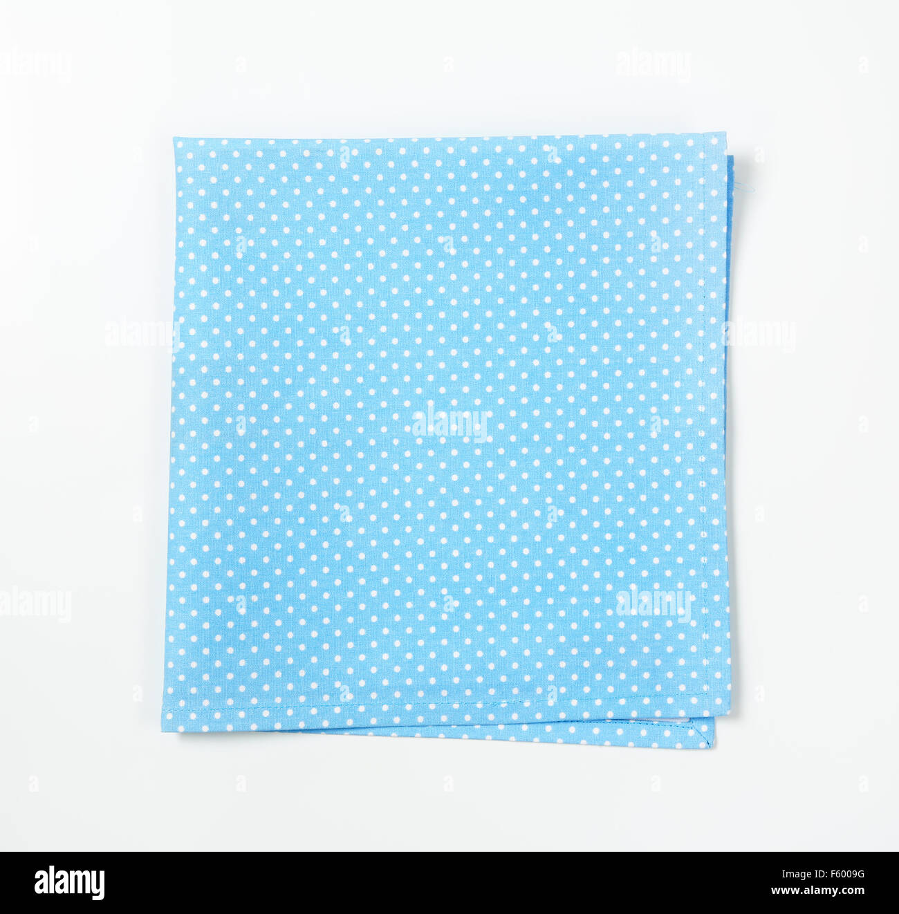 turquoise dotted place mat on white background Stock Photo - Alamy