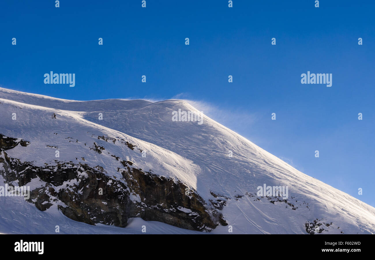 Snowy and windy hill (winter theme Stock Photo - Alamy