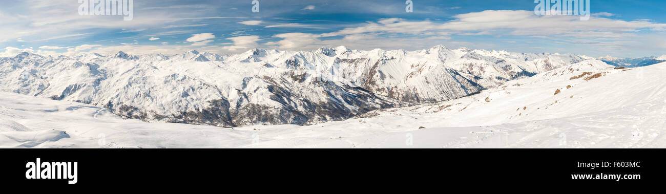 Panoramic view down a snowy mountain range valley in winter Stock Photo ...
