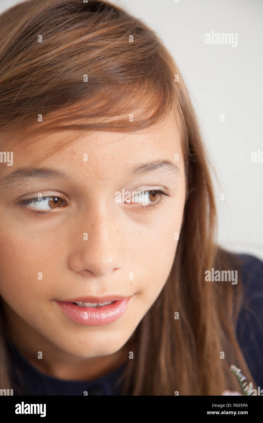 Young girl thinking Stock Photo - Alamy