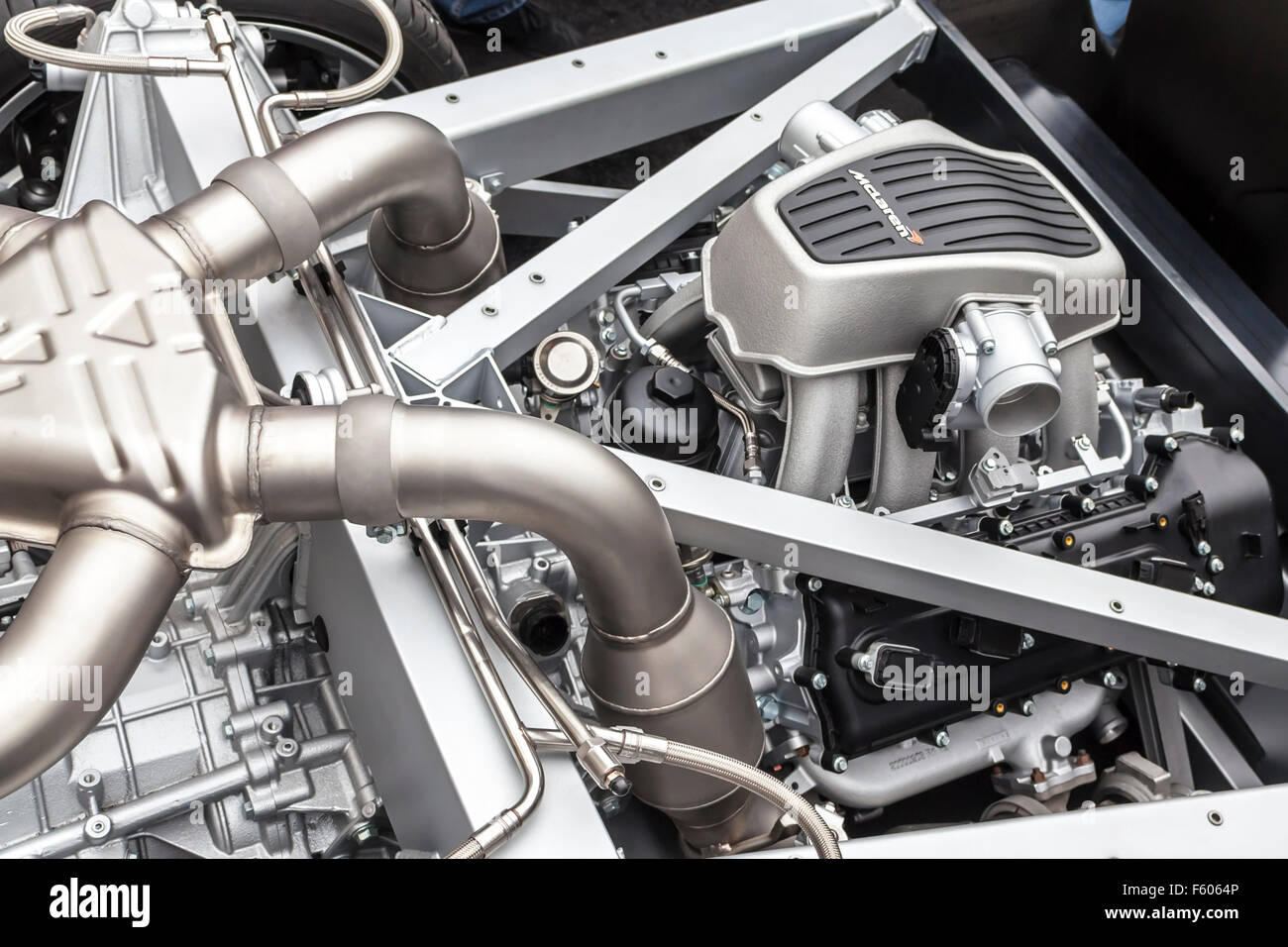 Closeup of a McLaren MP 4-12c engine in a bare chassis at the 2011 ...