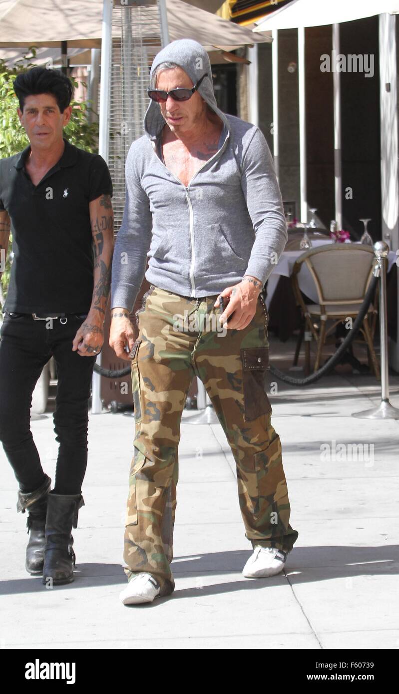 Mickey Rourke wearing a grey hoodie has lunch at Cafe Roma in Beverly ...