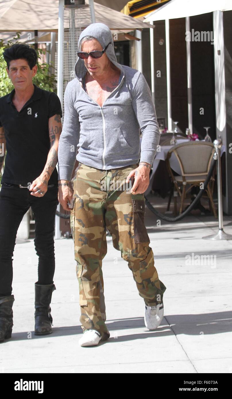 Mickey Rourke wearing a grey hoodie has lunch at Cafe Roma in Beverly ...