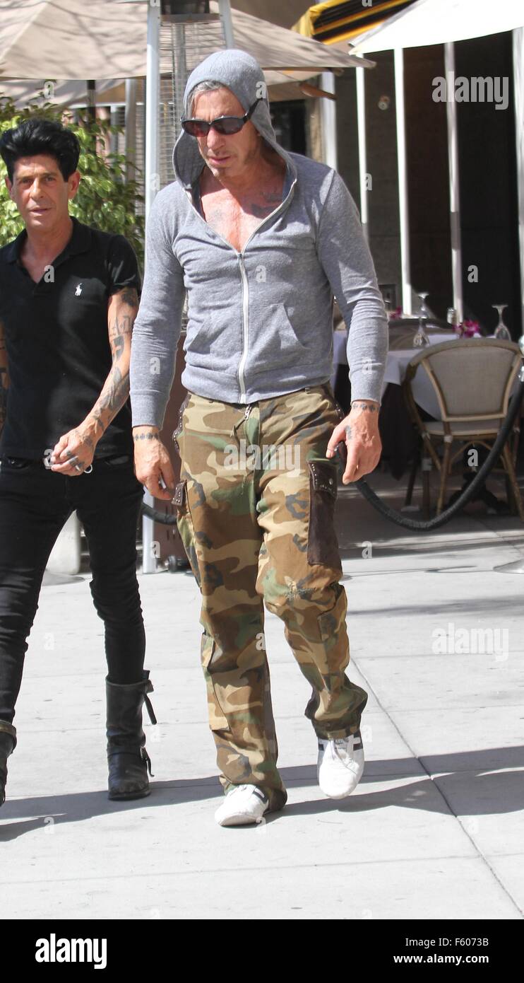 Mickey Rourke wearing a grey hoodie has lunch at Cafe Roma in Beverly ...