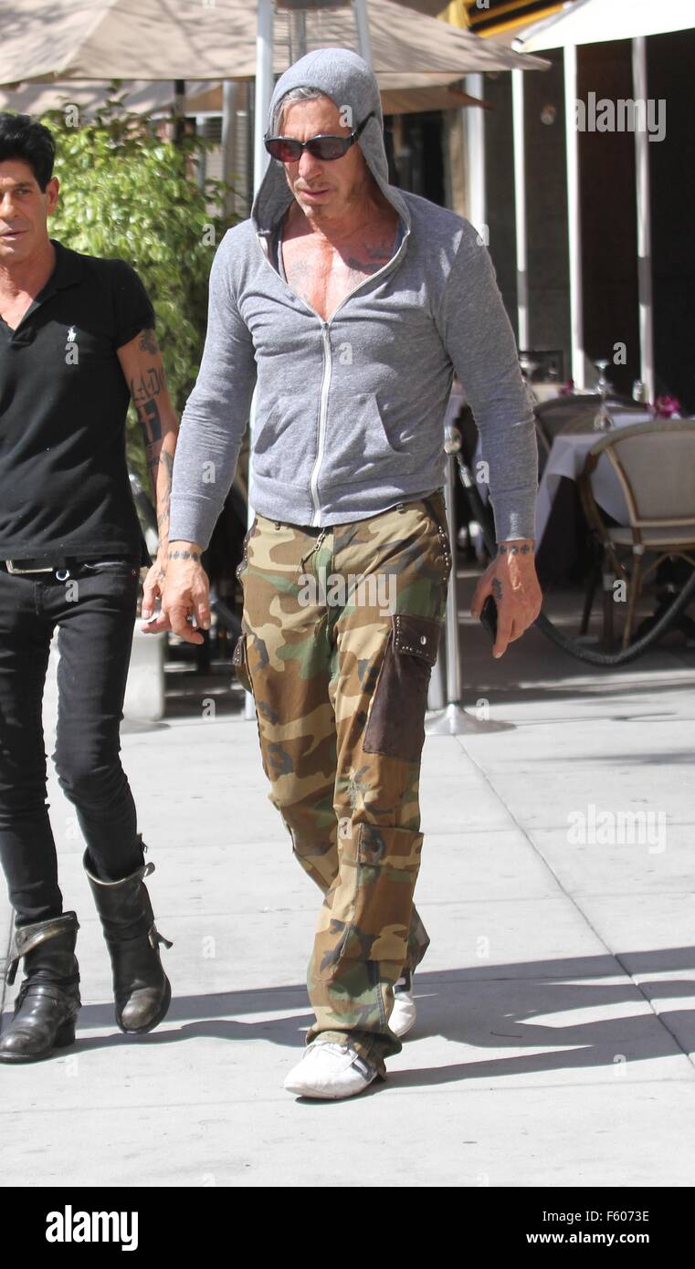 Mickey Rourke wearing a grey hoodie has lunch at Cafe Roma in Beverly ...
