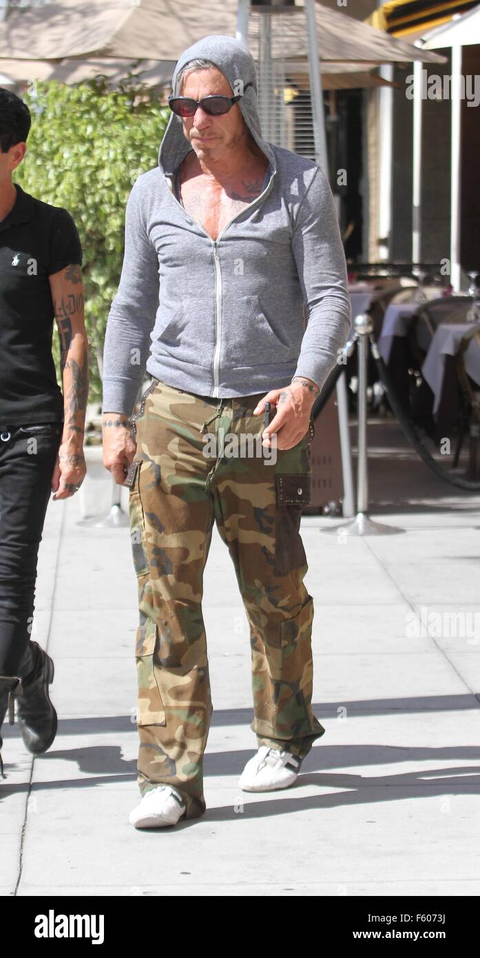 Mickey Rourke wearing a grey hoodie has lunch at Cafe Roma in Beverly ...