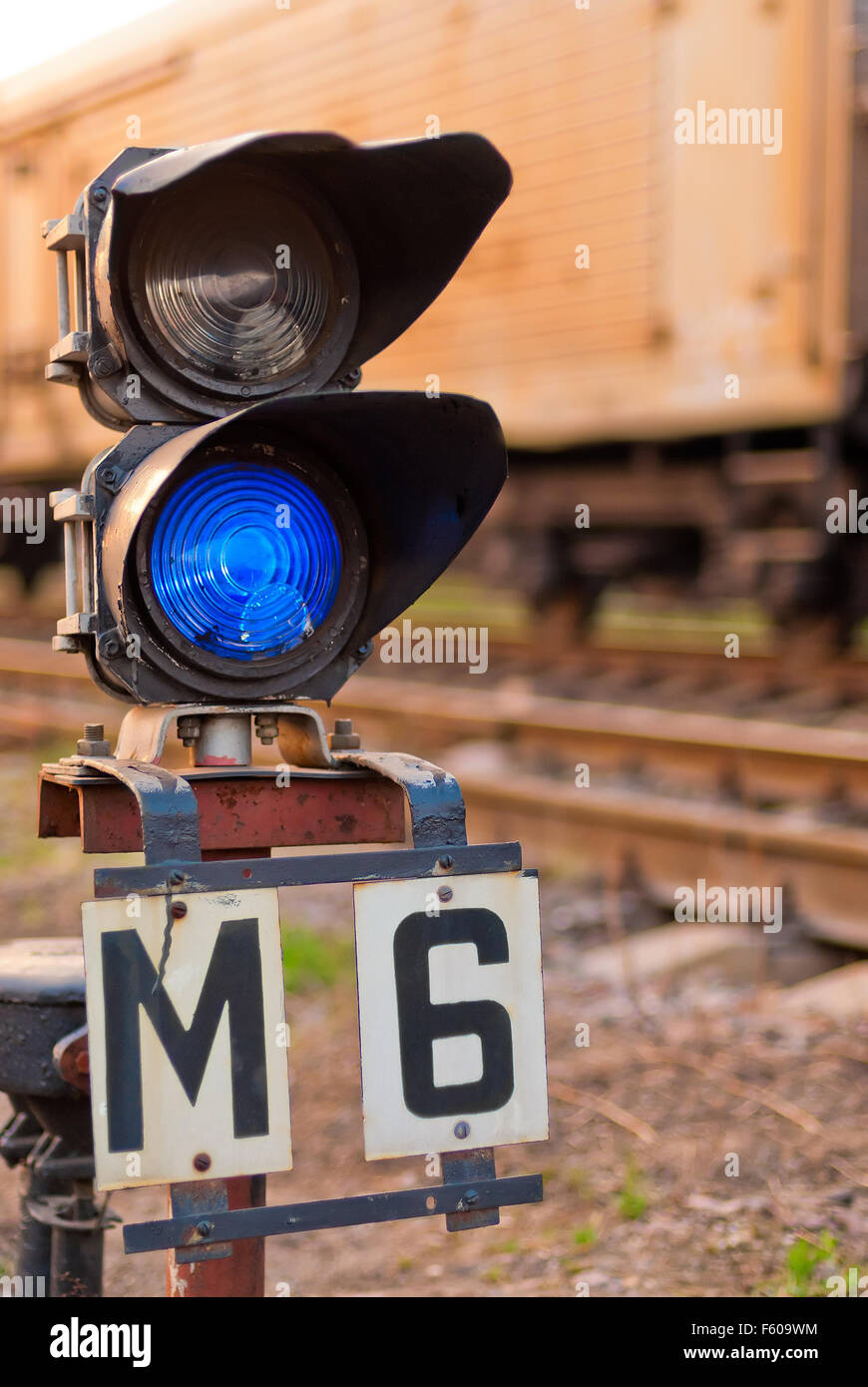 semaphore blue light for trains on the railway Stock Photo - Alamy