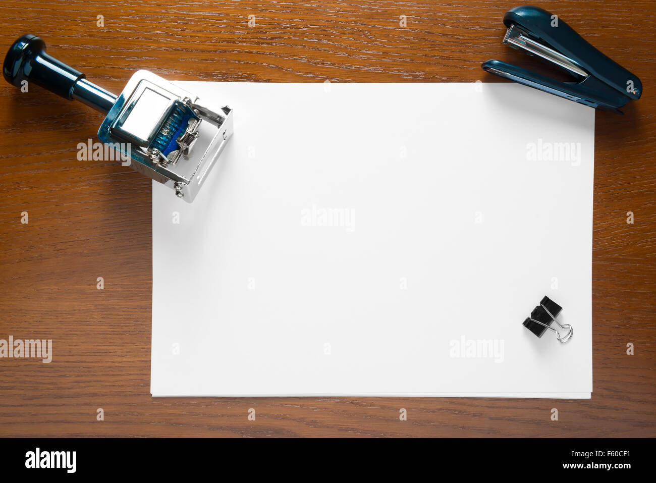 stamp and a blank sheet of paper on an office desk close up Stock Photo ...