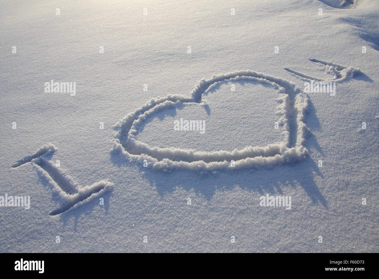 Message "I love you" on snow ground Stock Photo - Alamy