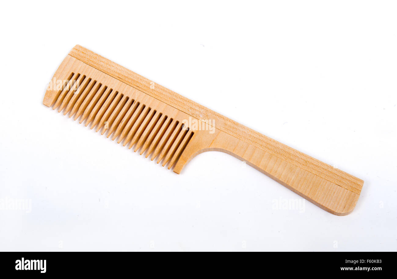 Wooden comb isolated on white background Stock Photo - Alamy