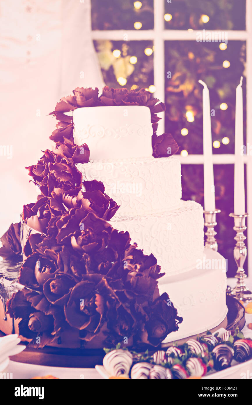 Gourmet tiered wedding cake at wedding reception Stock Photo - Alamy