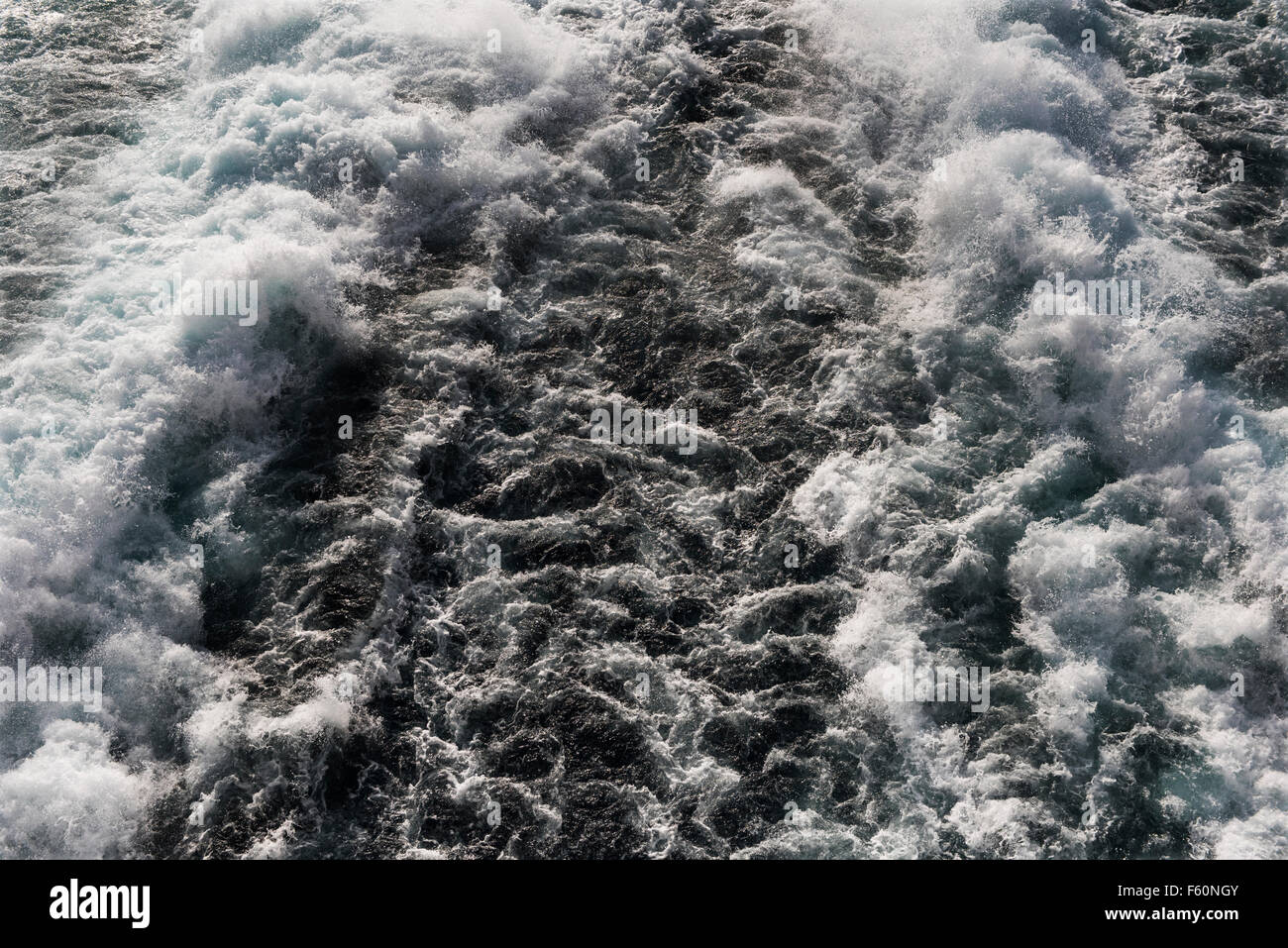 Rough water wake seen from stern of ship crossing the English Channel ...