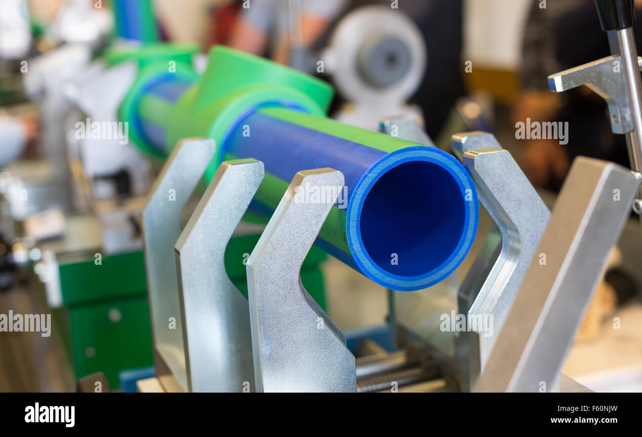 Assembly line of pipelines at workroom Stock Photo - Alamy