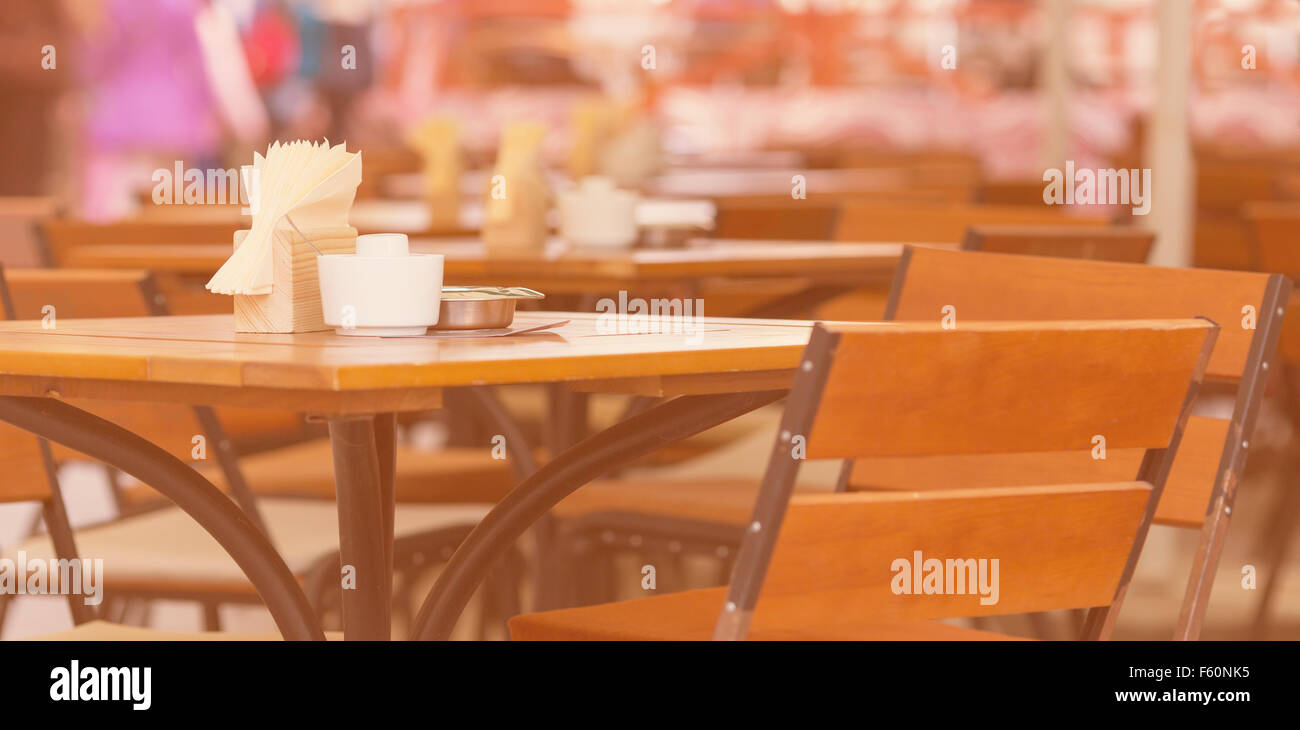 Restaurant table in old european town Stock Photo - Alamy
