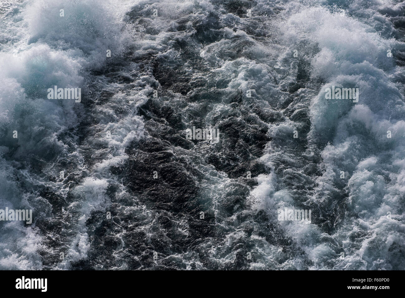 Rough water wake seen from stern of ship crossing the English Channel ...