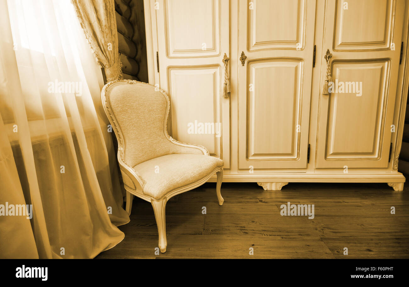 Interior of luxury vintage bedroom. Sepia toned Stock Photo - Alamy