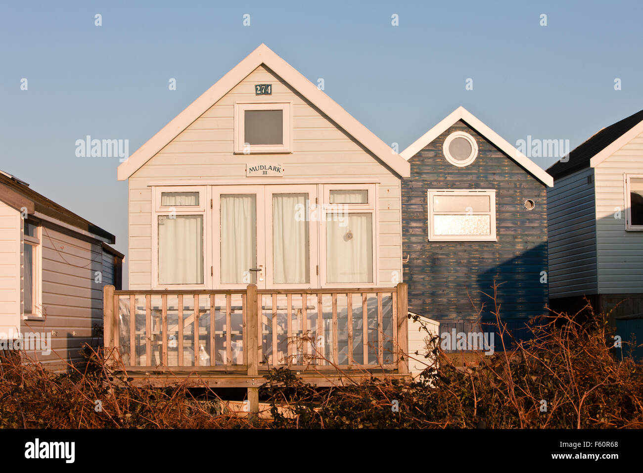 At sundown, beach hut at Mudeford, Christchurch Harbour near Poole ...