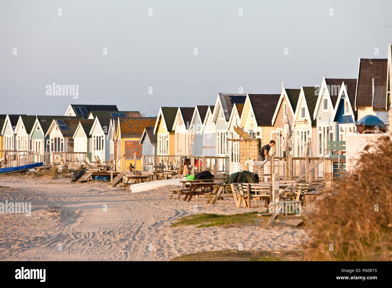 At sundown, beach hut at Mudeford, Christchurch Harbour near Poole ...