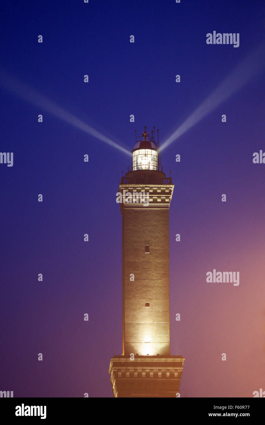 Lighthouse of Genoa at sunset. Genoa, Liguria, Italy Stock Photo - Alamy
