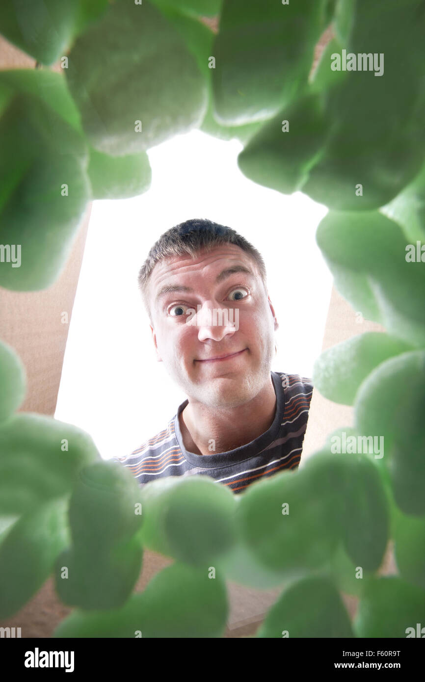 Male hand opening cardboard box hi-res stock photography and images - Alamy