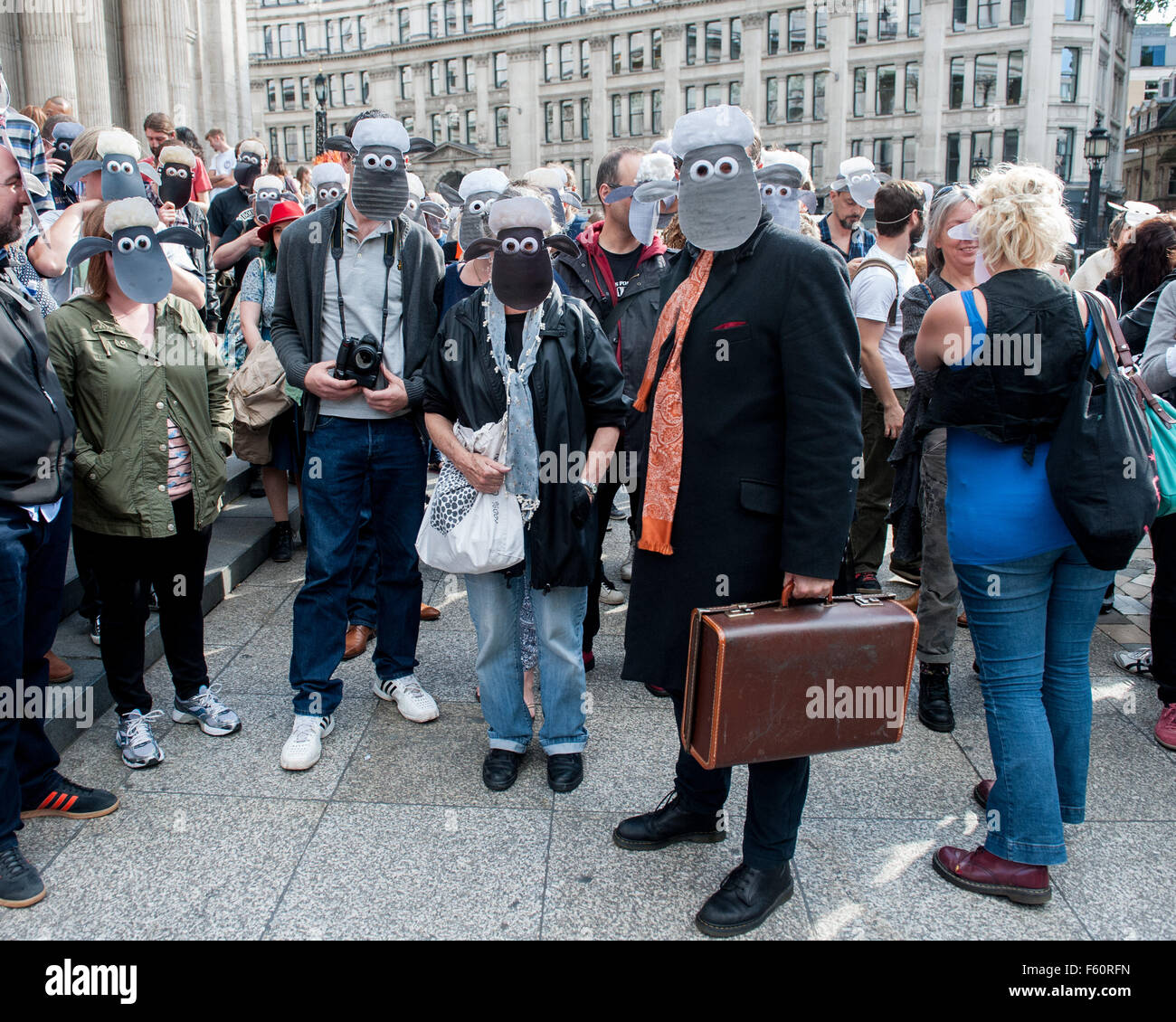 Mark Thomas, comedian and political activist holds a Sean the Sheep ...