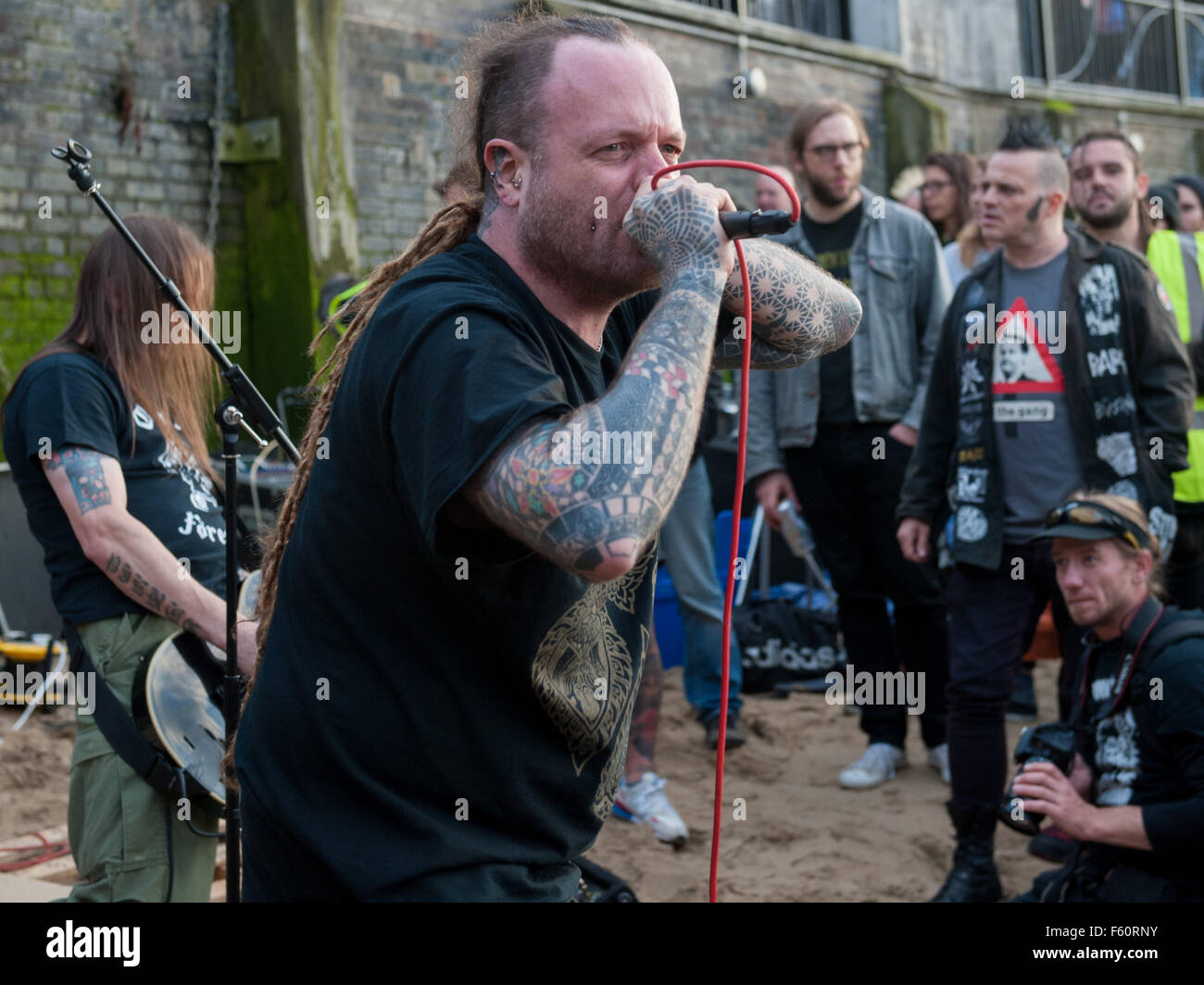 Hundreds of punks and activists danced on the shore of the Thames as ...