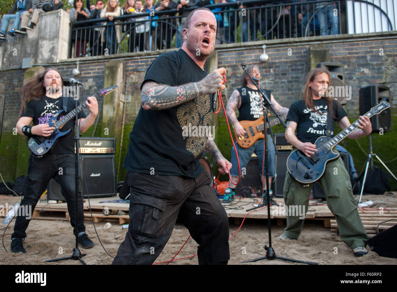Hundreds of punks and activists danced on the shore of the Thames as ...