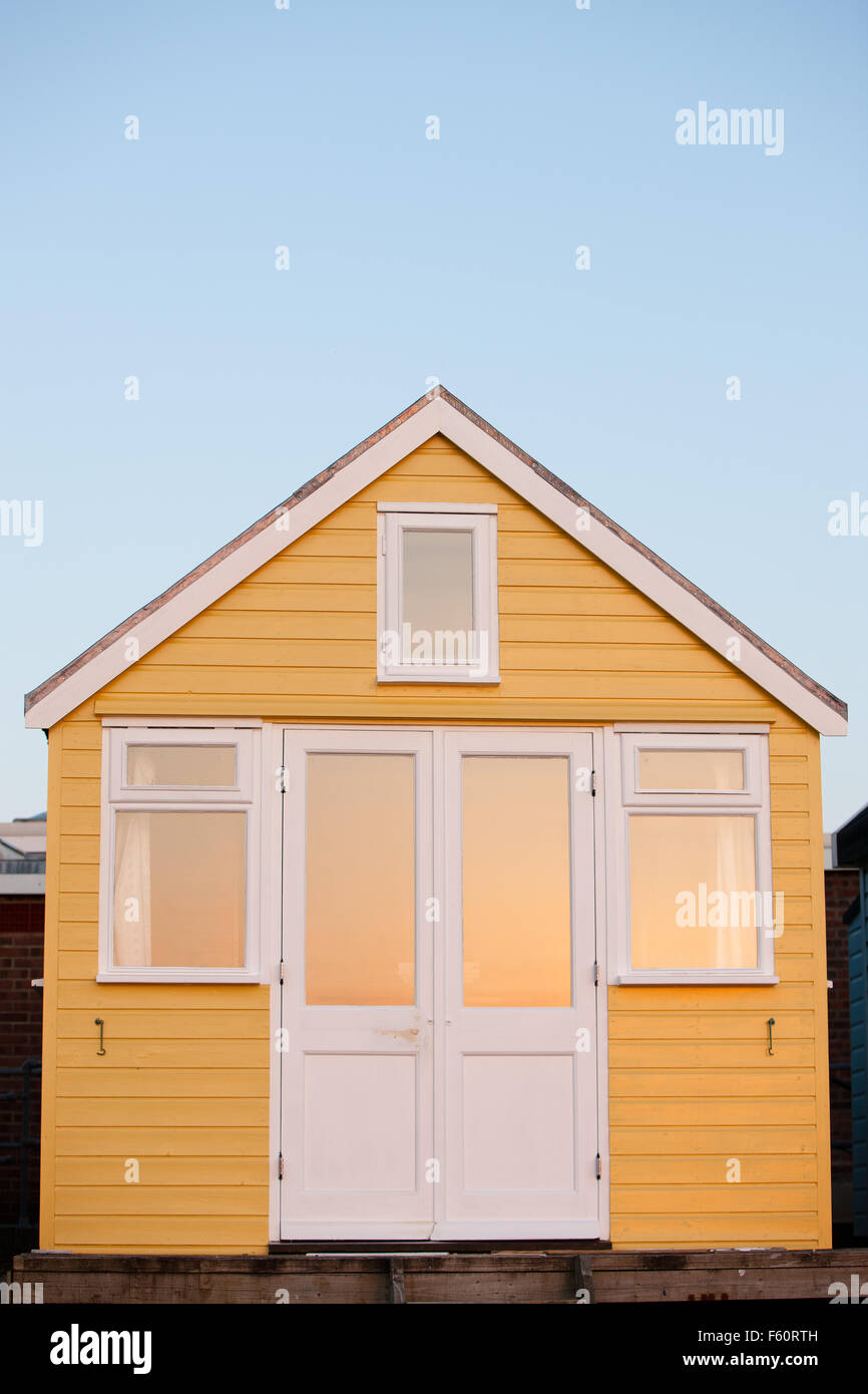 At sundown, beach hut at Mudeford, Christchurch Harbour near Poole ...