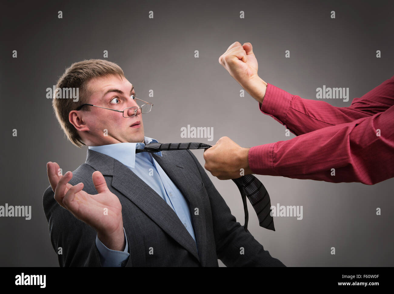 Aggressive office worker put up a fight Stock Photo - Alamy