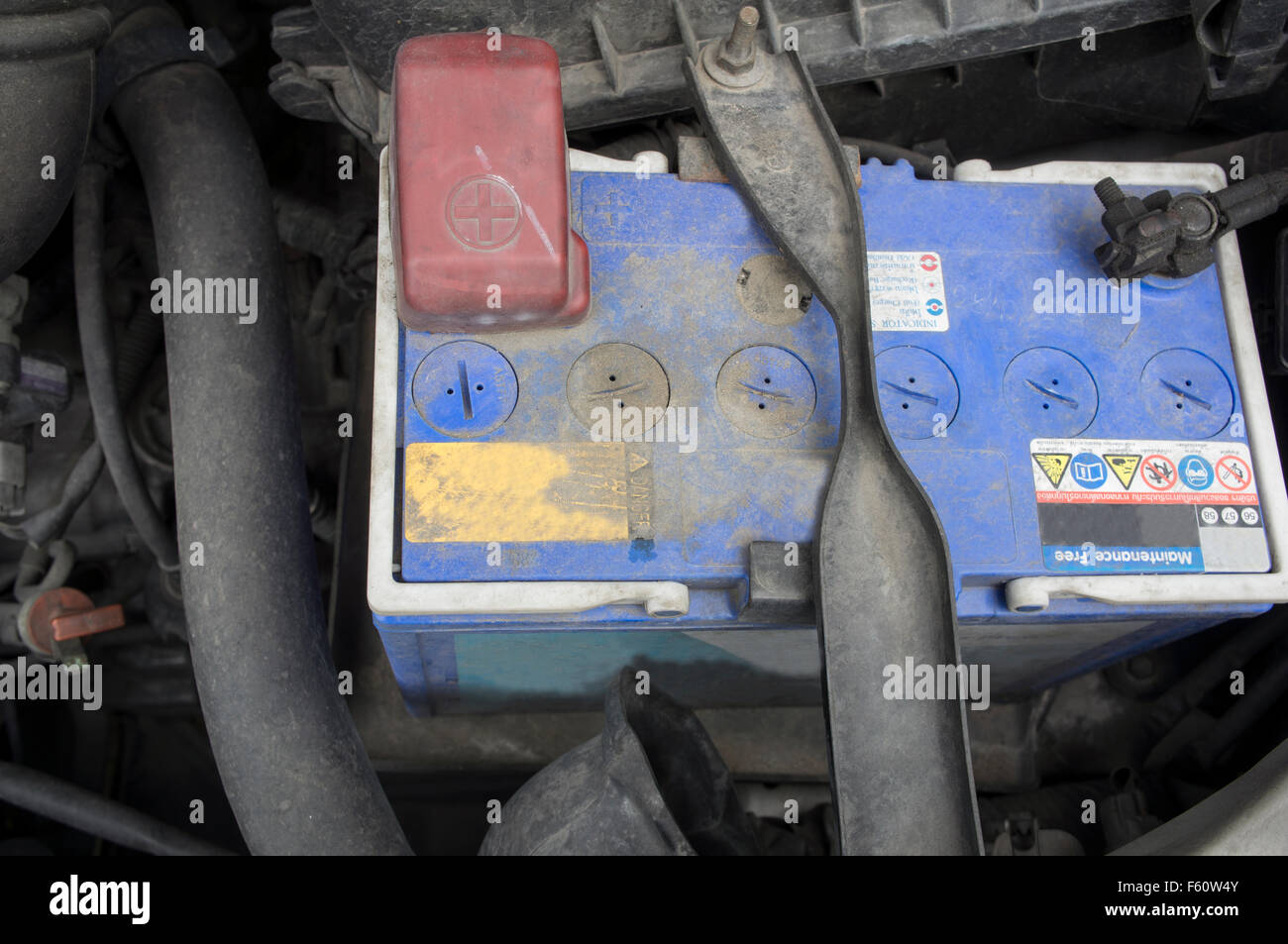 car automobile battery service positive sign Stock Photo - Alamy