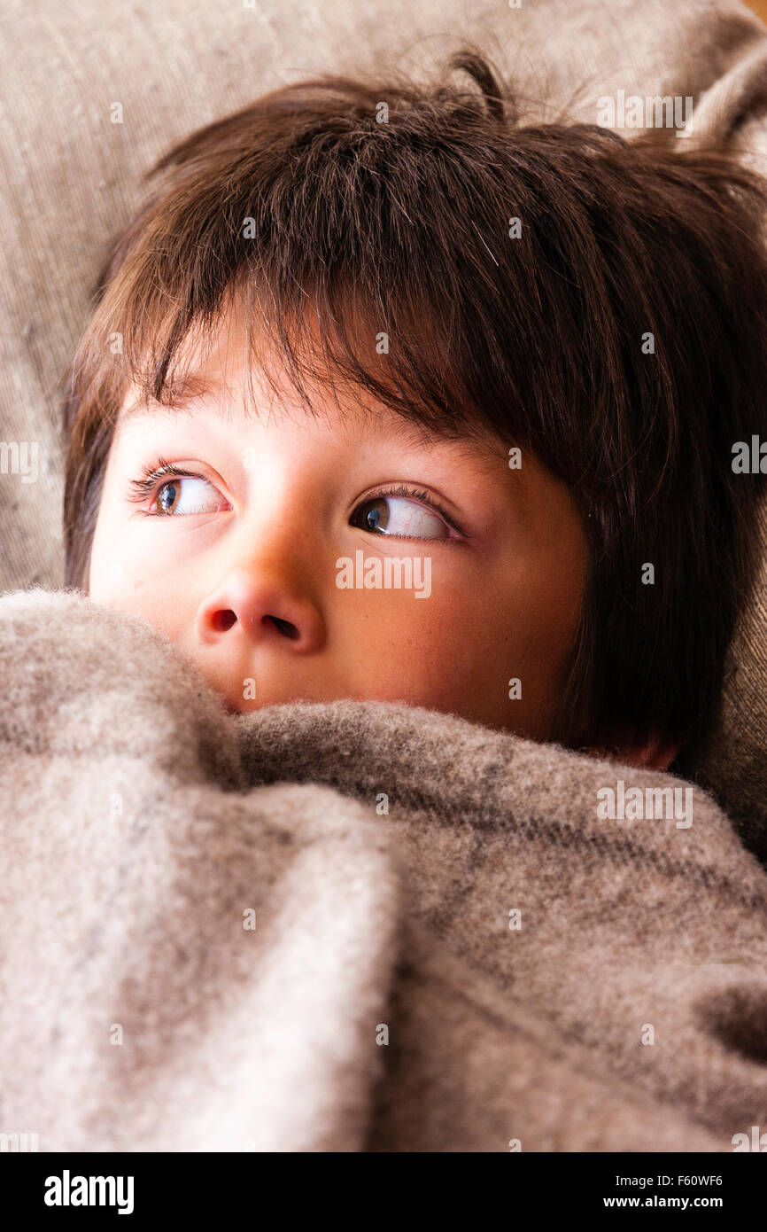 Child with head turned sideways hi-res stock photography and images - Alamy