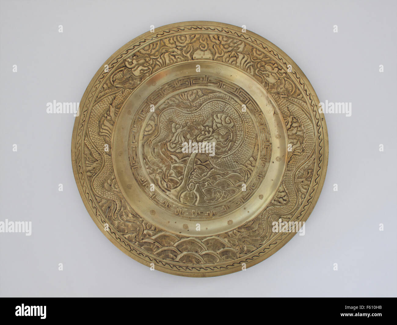 Chinese brass plate incised with a dragon Stock Photo - Alamy