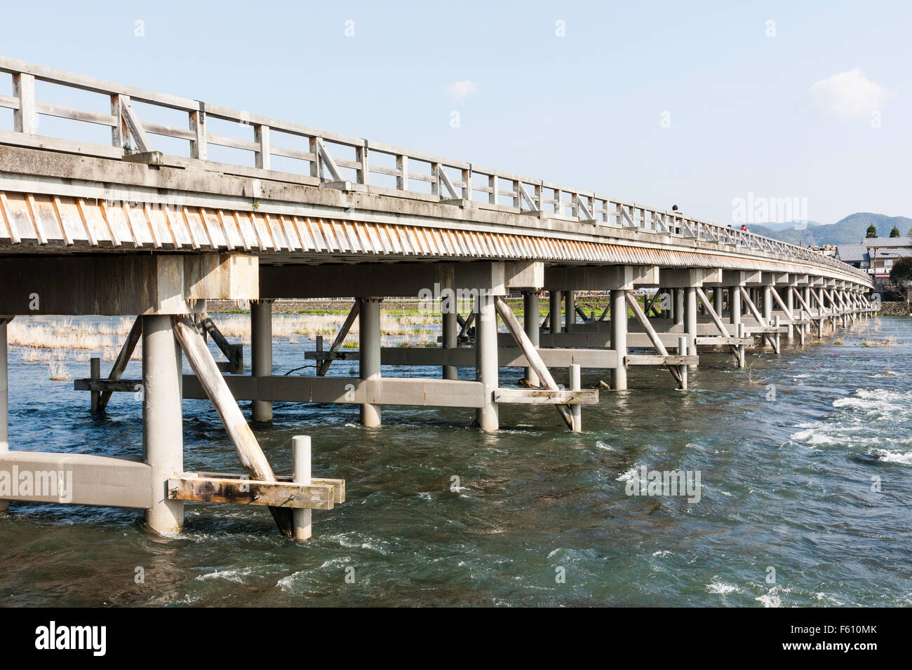 Japan, Kyoto, Arashiyama. Low-angle shot of the famous Togetsukyo ...
