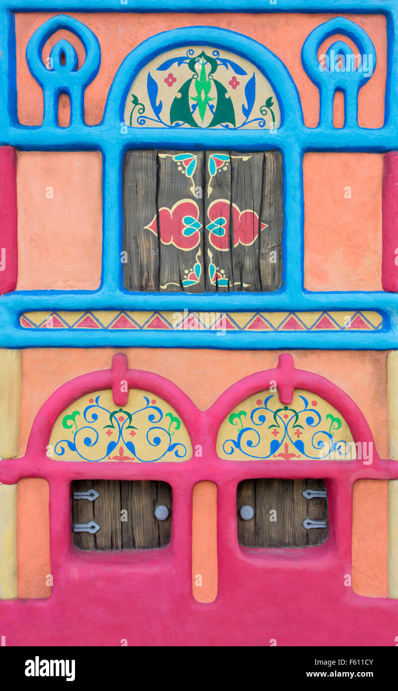 Fairy-tale colorful castle with small windows Stock Photo - Alamy