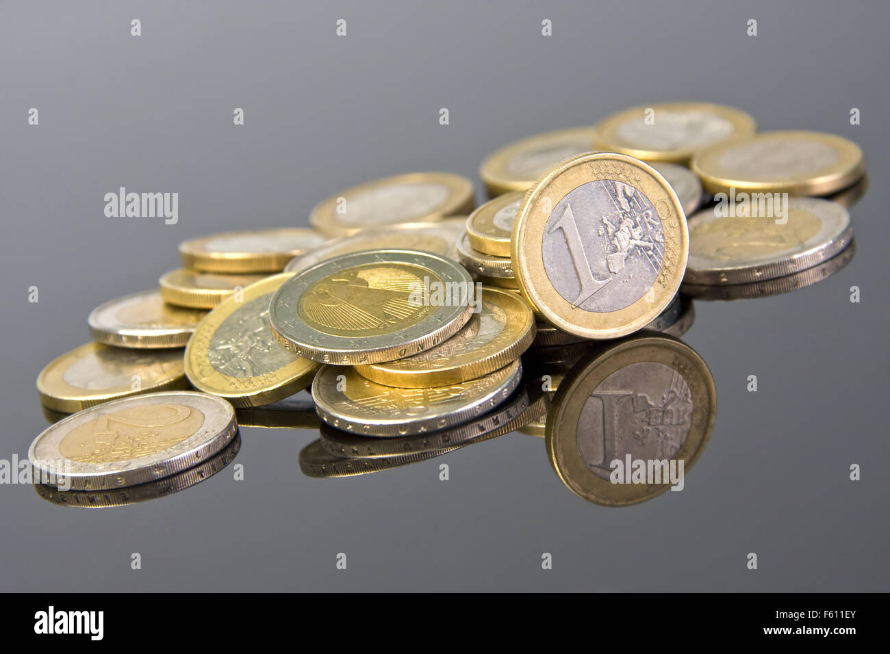 Few euro coins Stock Photo - Alamy