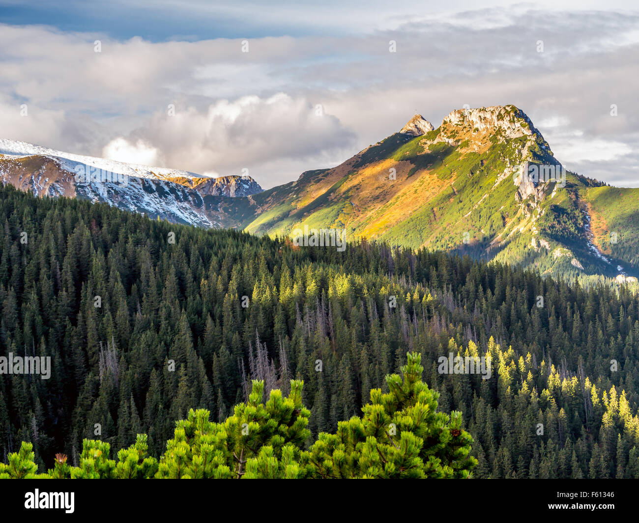 Mount Giewont in beautiful autumn colors seen from the alpine trail in ...
