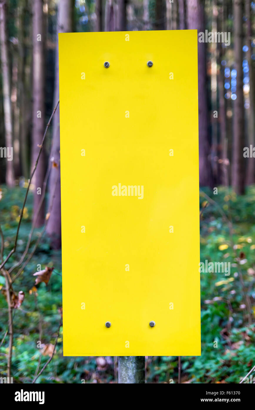 Image of empty yellow sign with free space in forest Stock Photo - Alamy