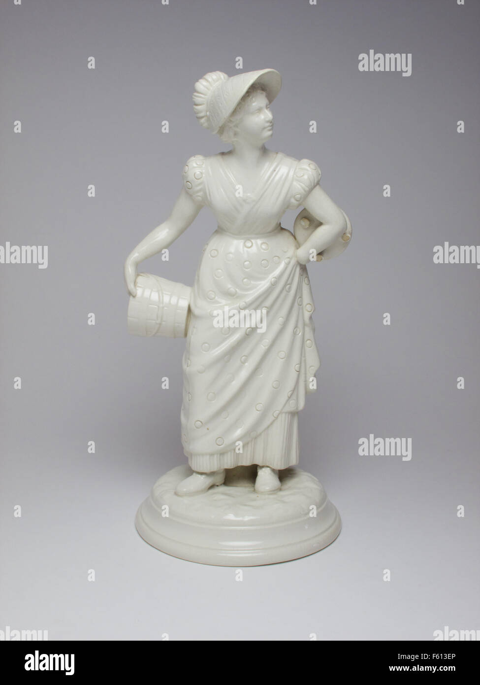 Antique salt glazed Wedgwood figure of a milkmaid Stock Photo - Alamy