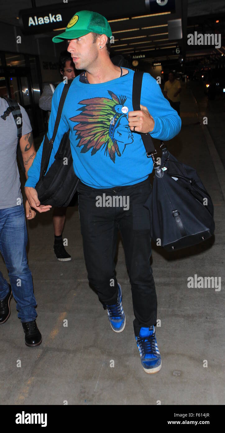 Chris Martin departs from Los Angeles International Airport (LAX ...