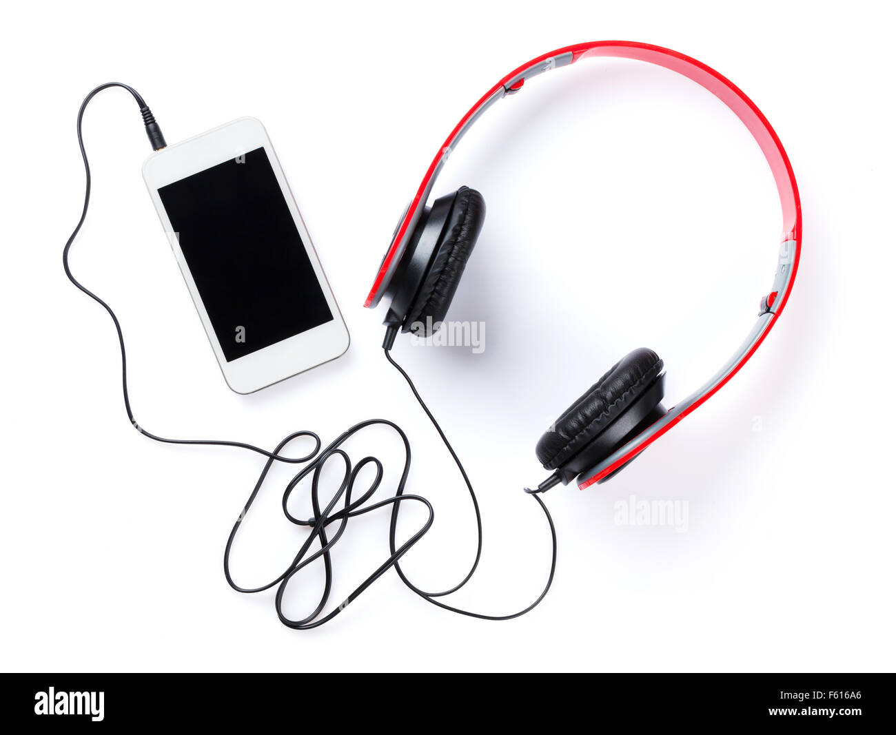 Headphones and smartphone. Isolated on white background Stock Photo - Alamy