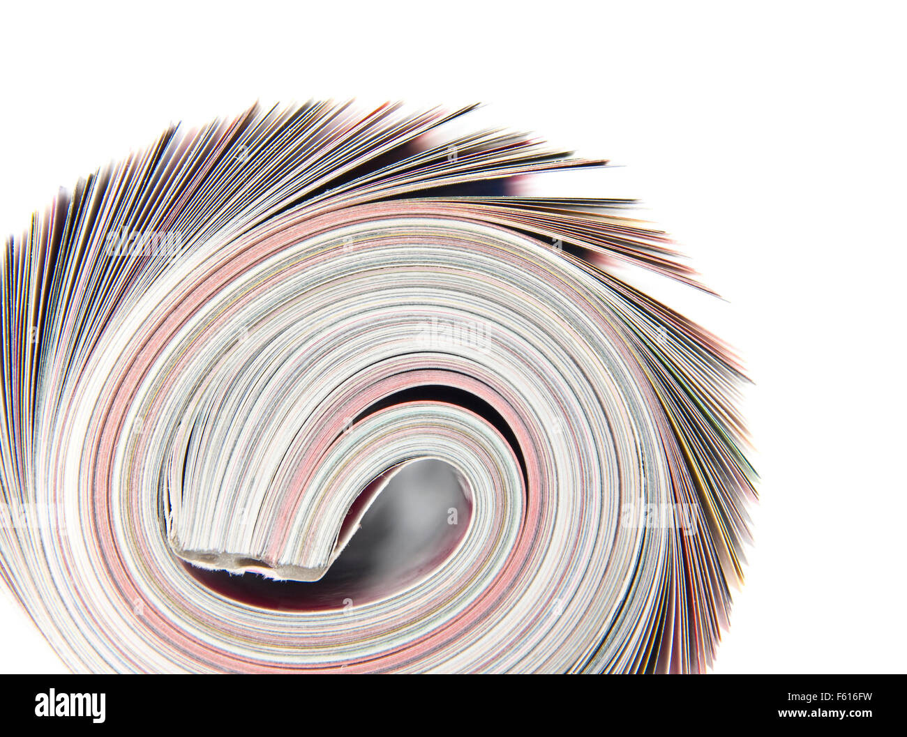 Rolled up magazine Stock Photo - Alamy