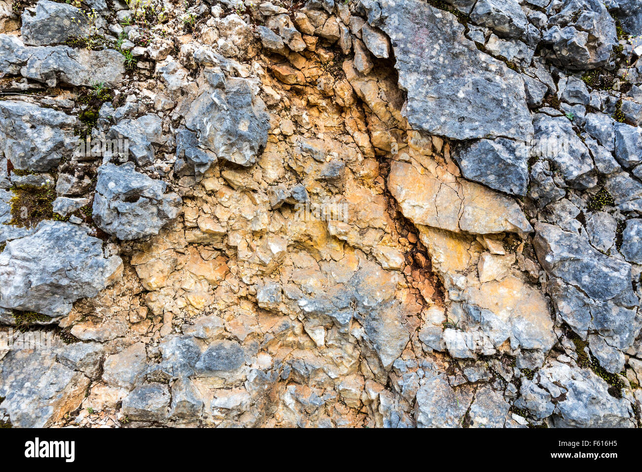 Cracked rock wall. Texture or background Stock Photo - Alamy