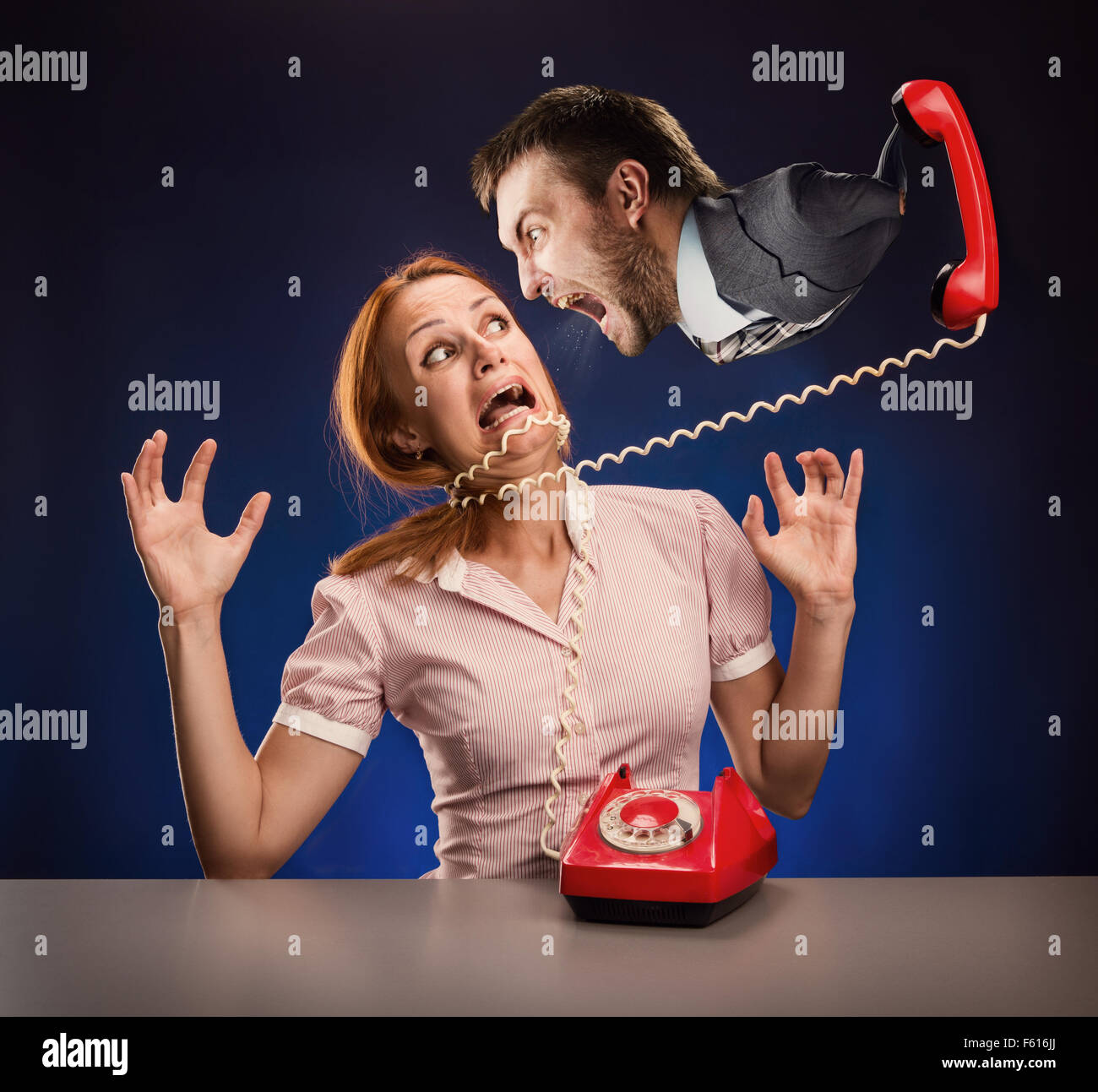 Mad boss is screaming to assistant from red phone Stock Photo - Alamy