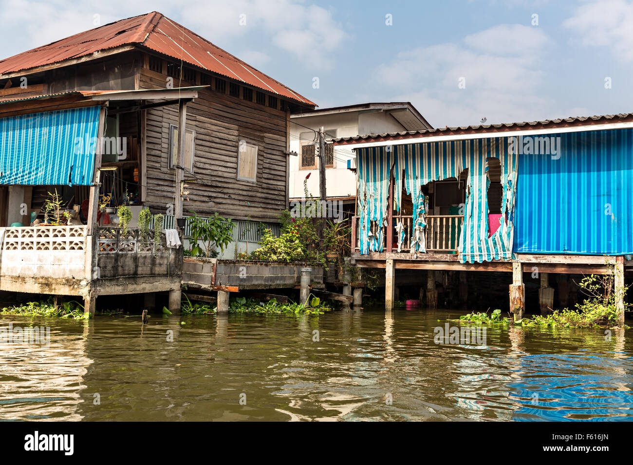 Slums on dirty canal in Asia Stock Photo - Alamy