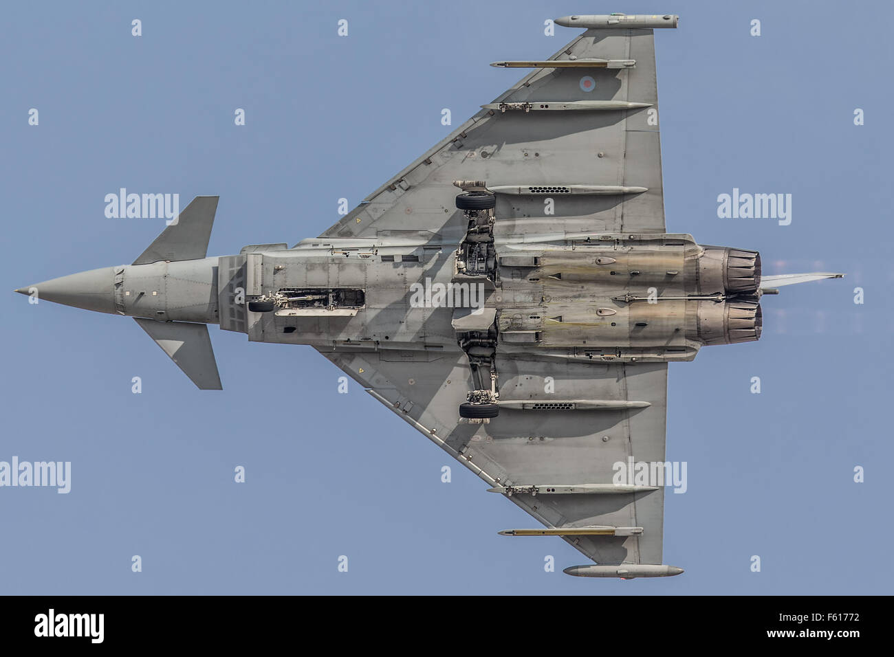 Gray jet fighter Eurofighter Typhoon flies against the backdrop of sky ...