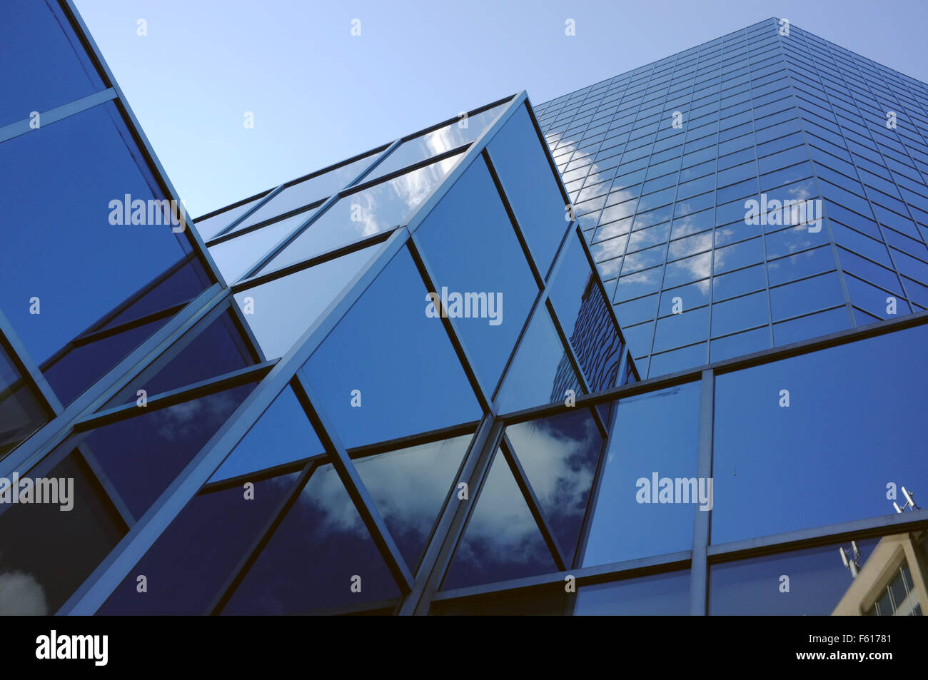 A blue glass skyscraper in the centre of the Canadian city of Hamilton ...